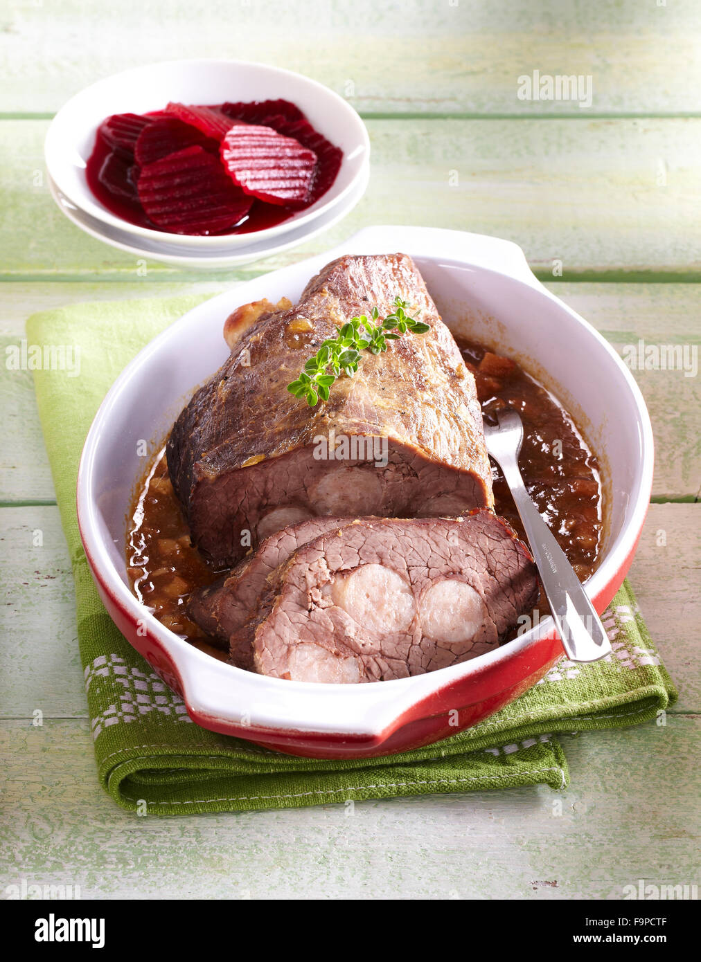 Sausage larded beef roast Stock Photo - Alamy