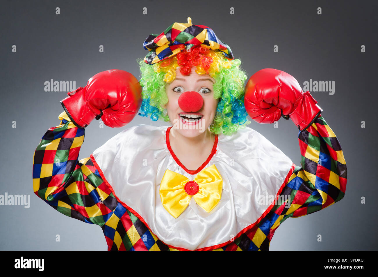 Funny clown with boxing gloves Stock Photo - Alamy