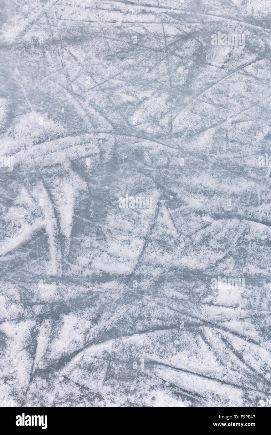 Details of an ice skating rink, with marks and scratches of skate ...