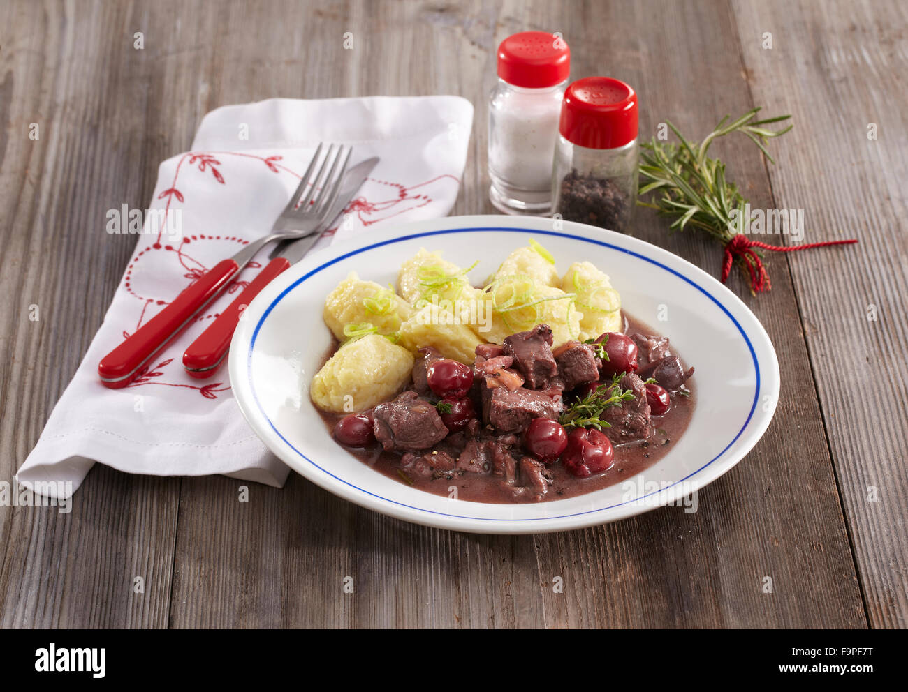Duck and sour cherry stew Stock Photo - Alamy