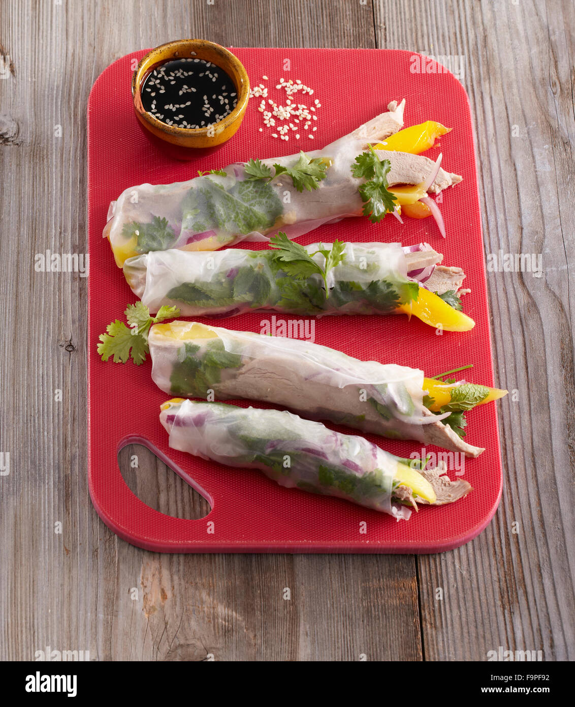 Duck and mango spring rolls Stock Photo - Alamy