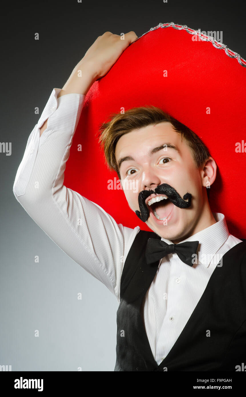 Person wearing sombrero hat in funny concept Stock Photo - Alamy