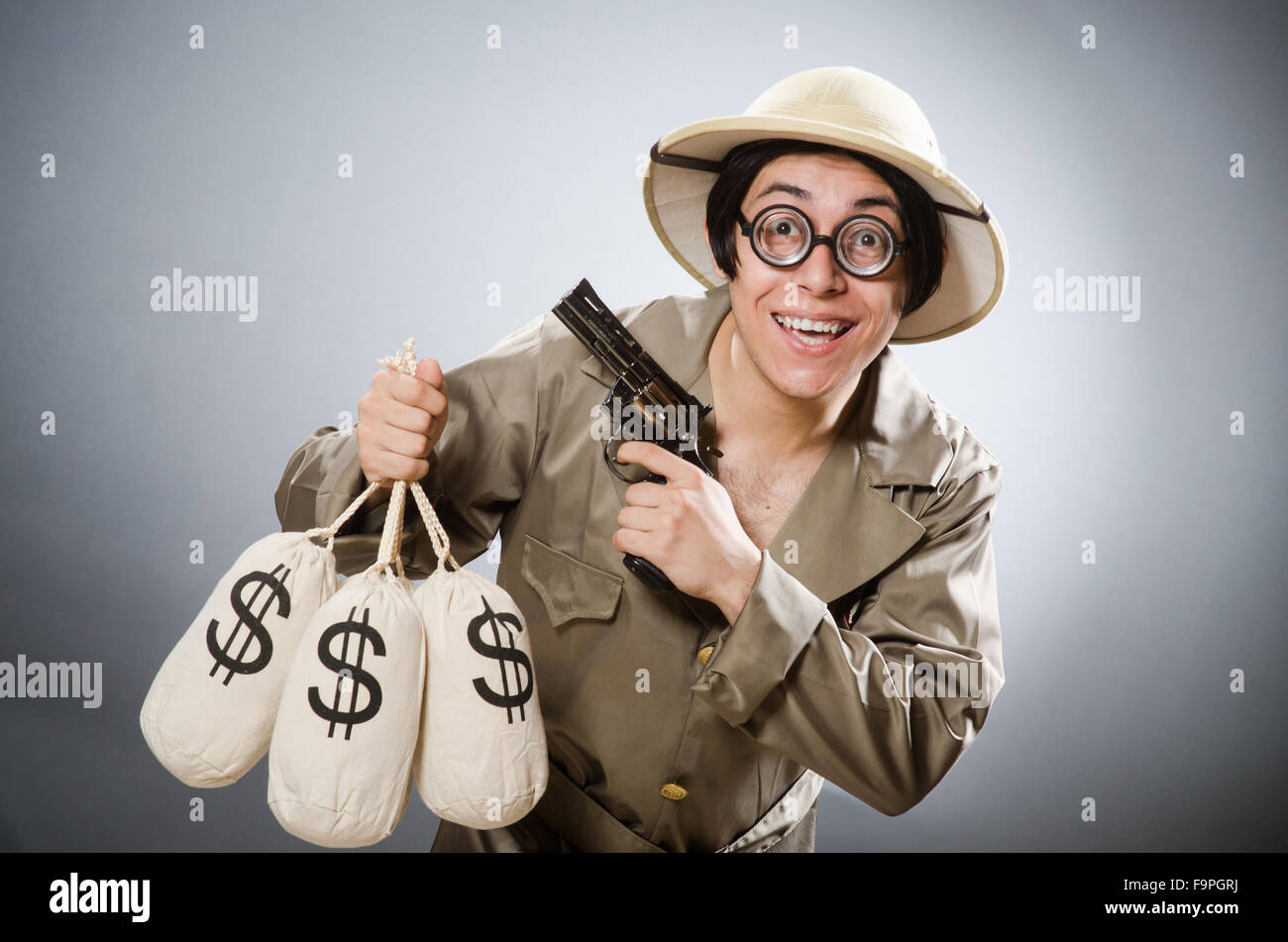Funny safari traveller in travelling concept Stock Photo - Alamy