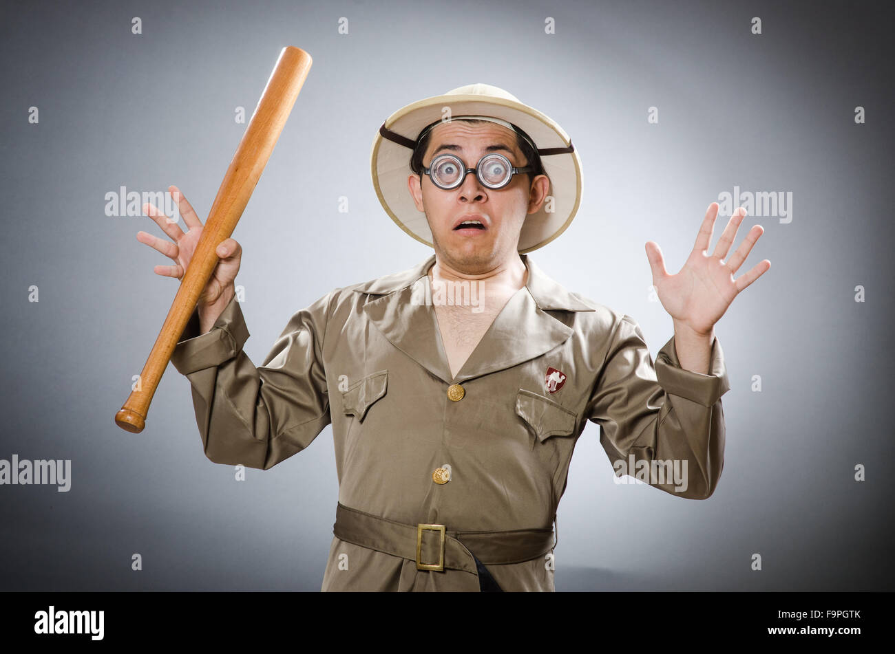 Funny safari traveller in travelling concept Stock Photo - Alamy