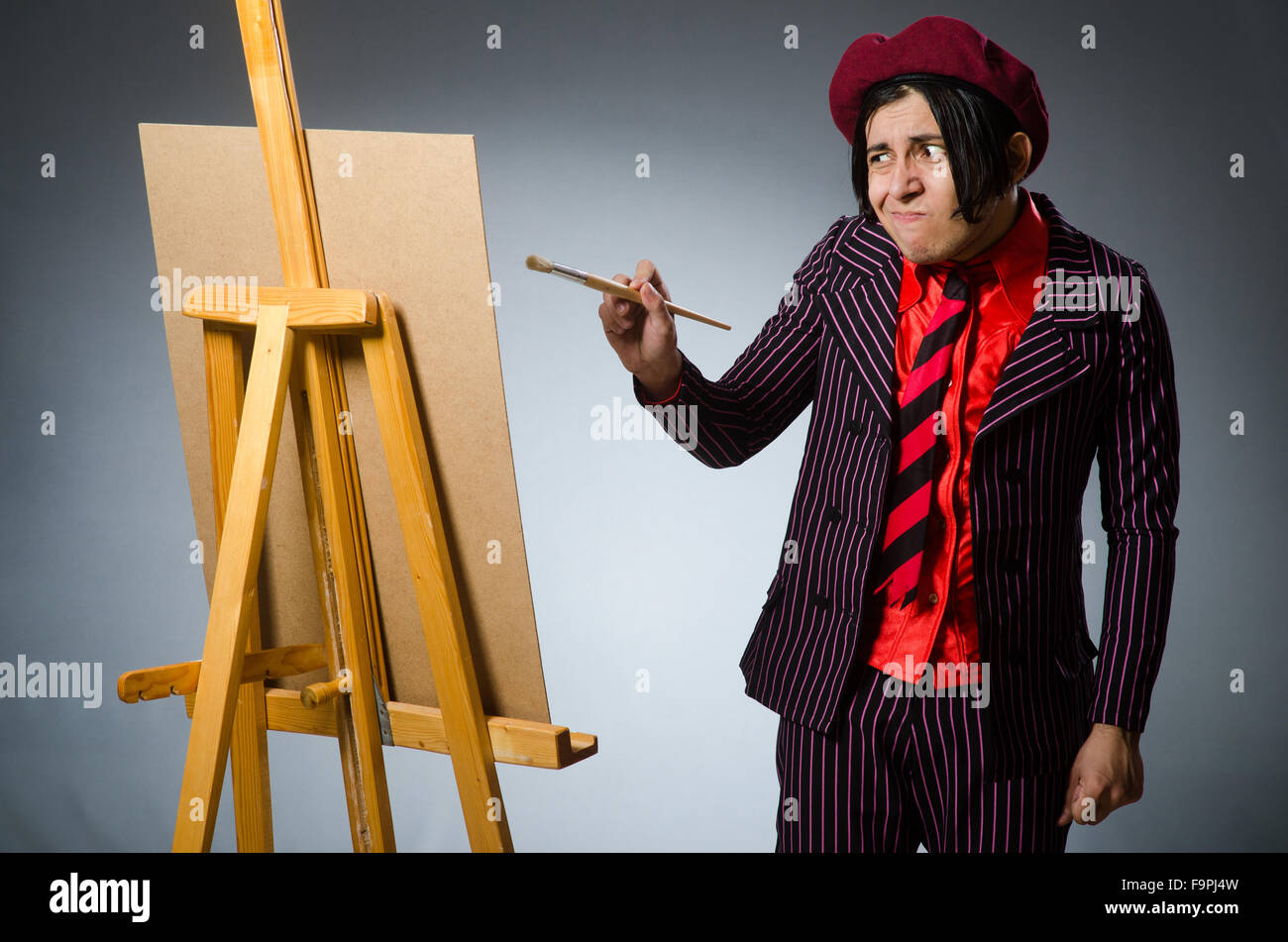 Funny artist with his artwork Stock Photo - Alamy