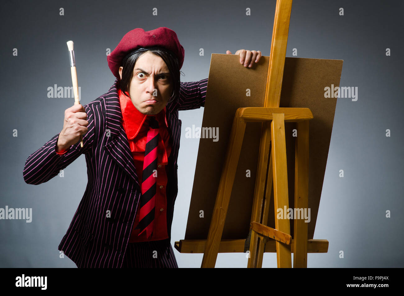 Funny artist with his artwork Stock Photo - Alamy