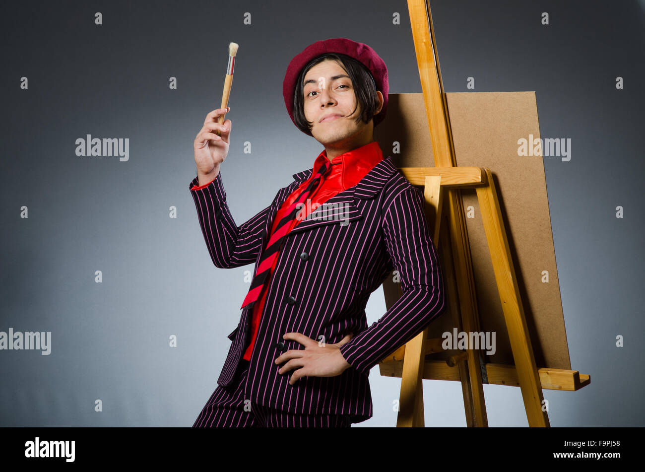 Funny artist with his artwork Stock Photo - Alamy