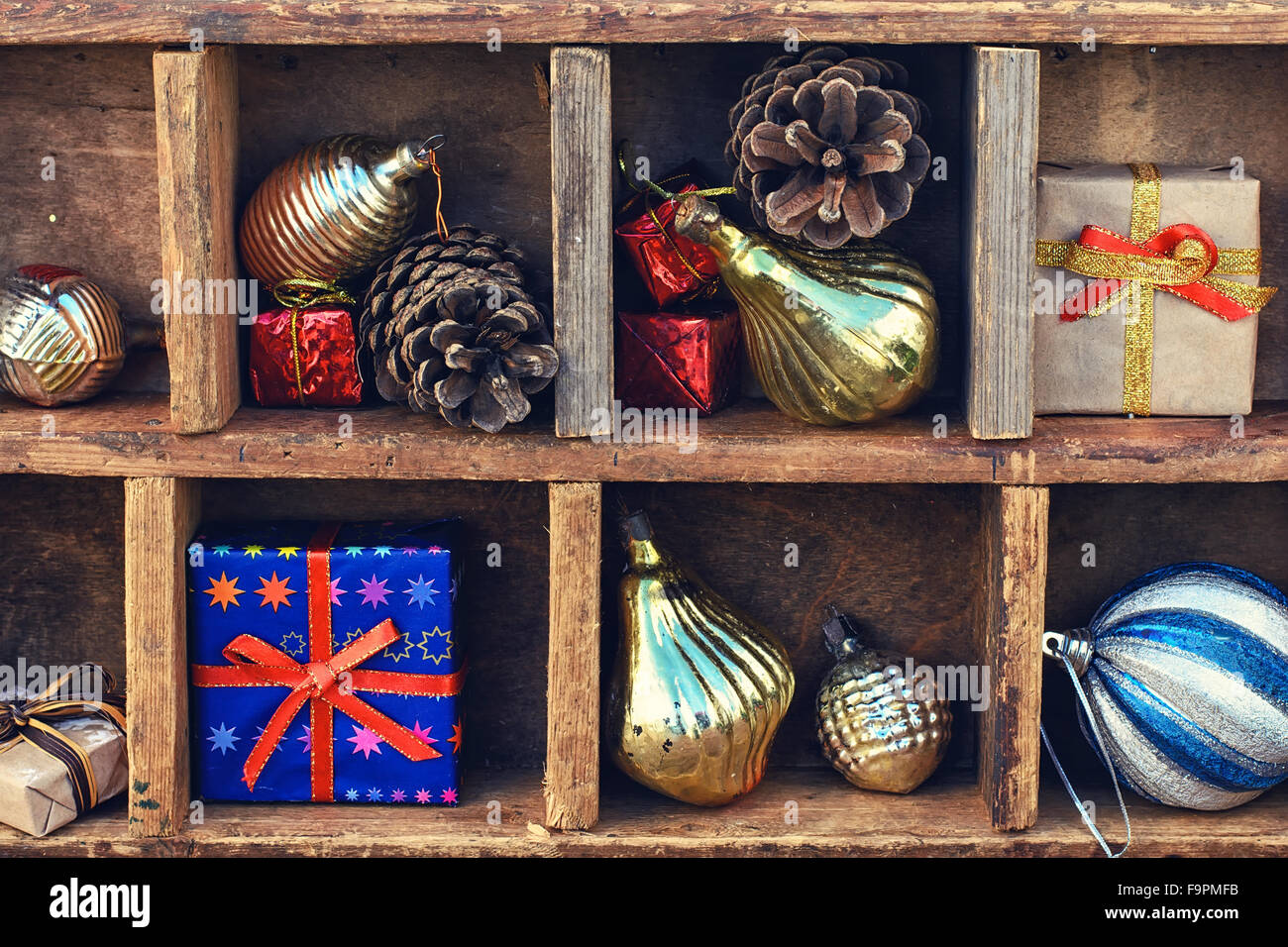 Vintage wooden box with compartments in which Christmas toys and gifts ...