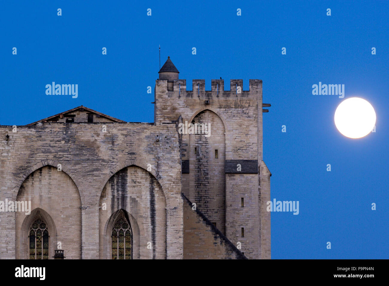 Full moon over Old Town in Avignon in France Stock Photo - Alamy