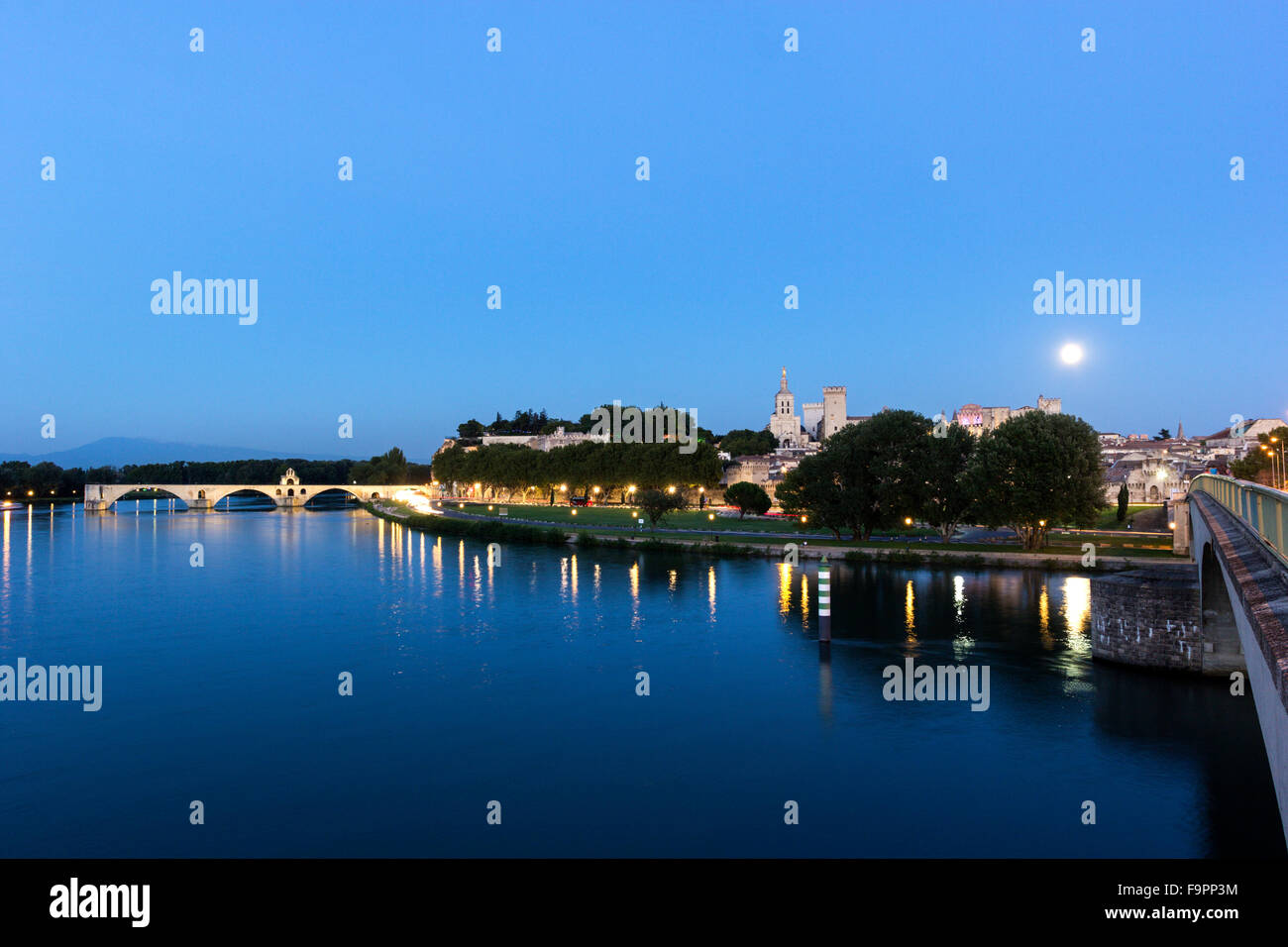 Full moon over Old Town in Avignon in France Stock Photo - Alamy
