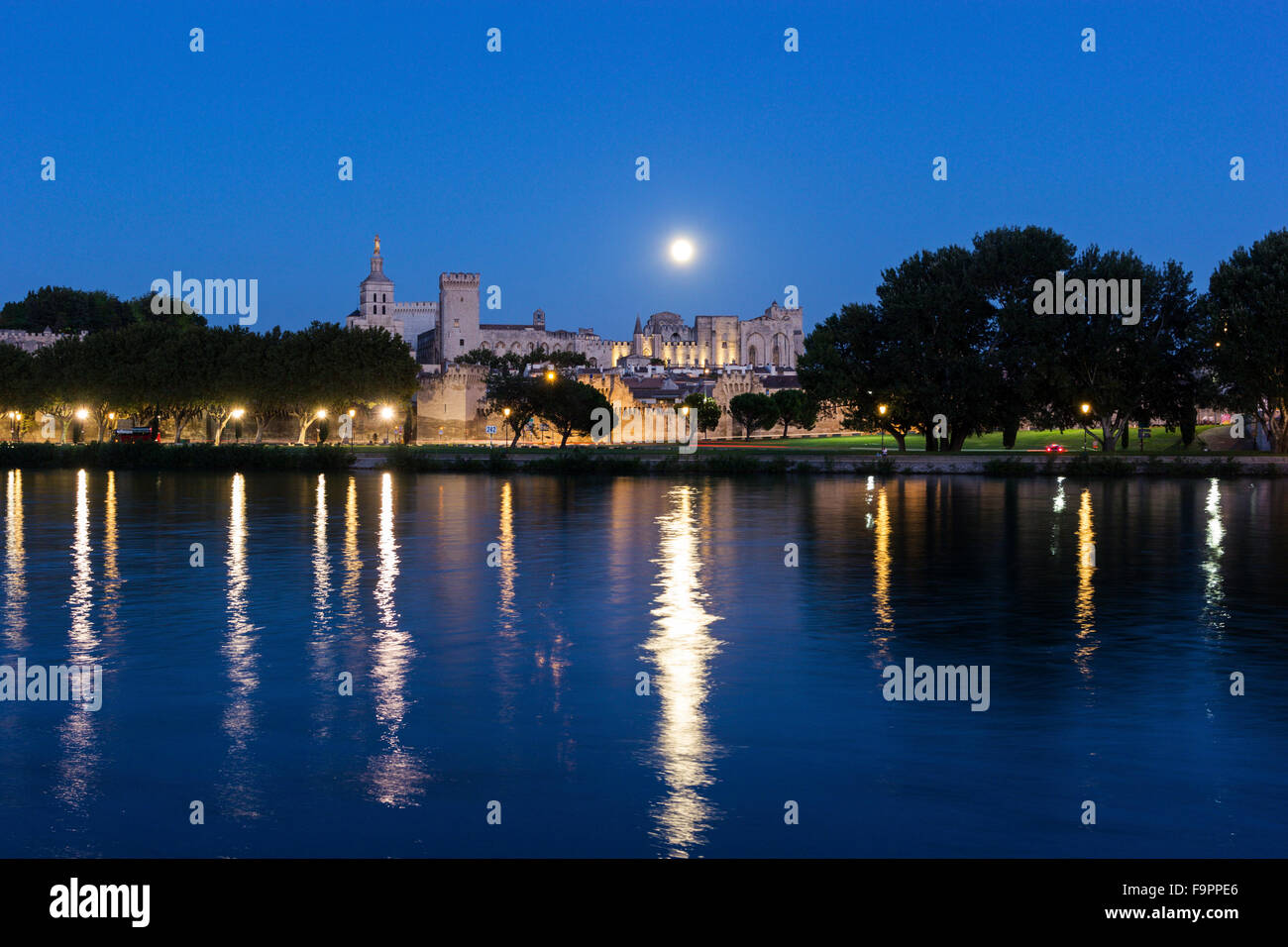 Full moon over Old Town in Avignon in France Stock Photo - Alamy