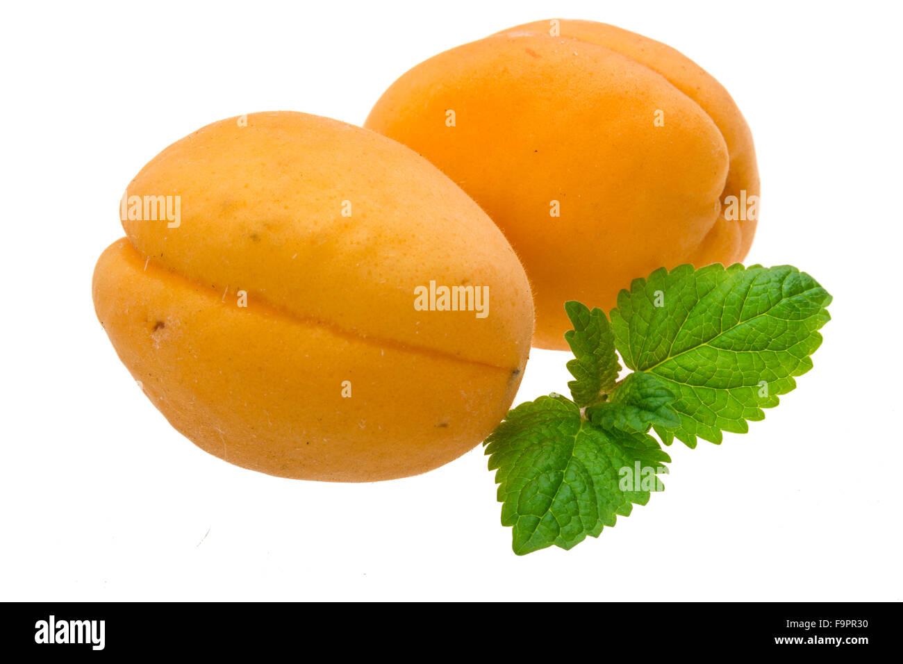 Apricot with pepper mint leaf Stock Photo - Alamy