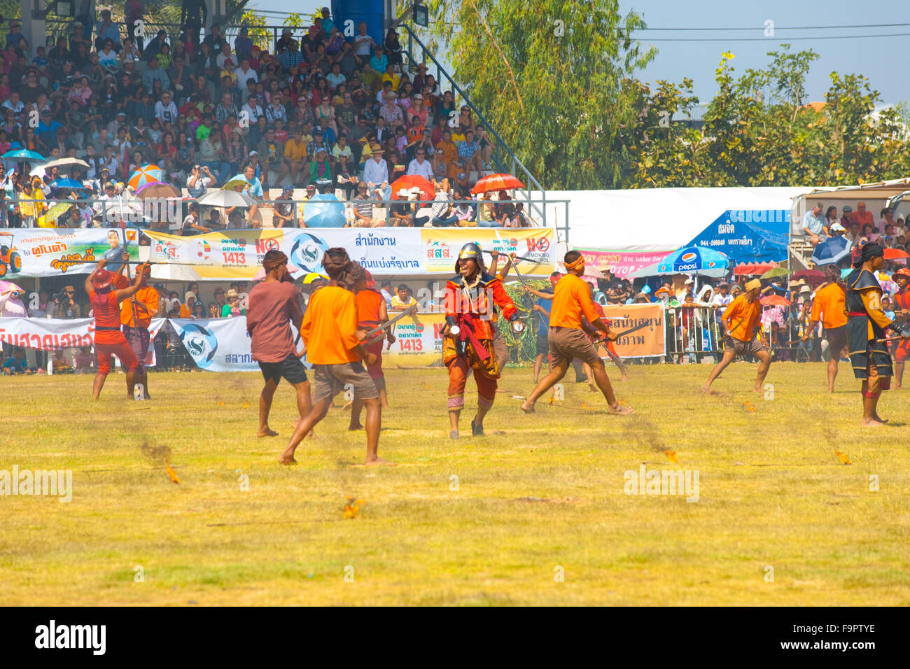 Audience watching Siamese and Burmese soldiers fighting hand to hand ...