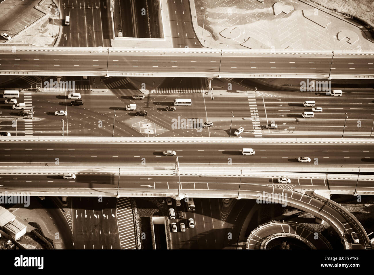 Top view of highway interchange in Dubai, UAE. Horizontal sepia shot ...