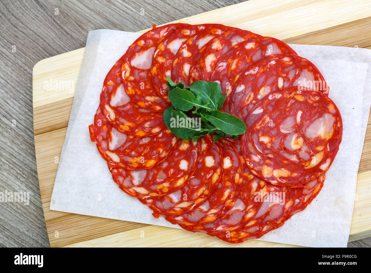 Traditional Spanish salami - Chorizo sausage on the wood background ...