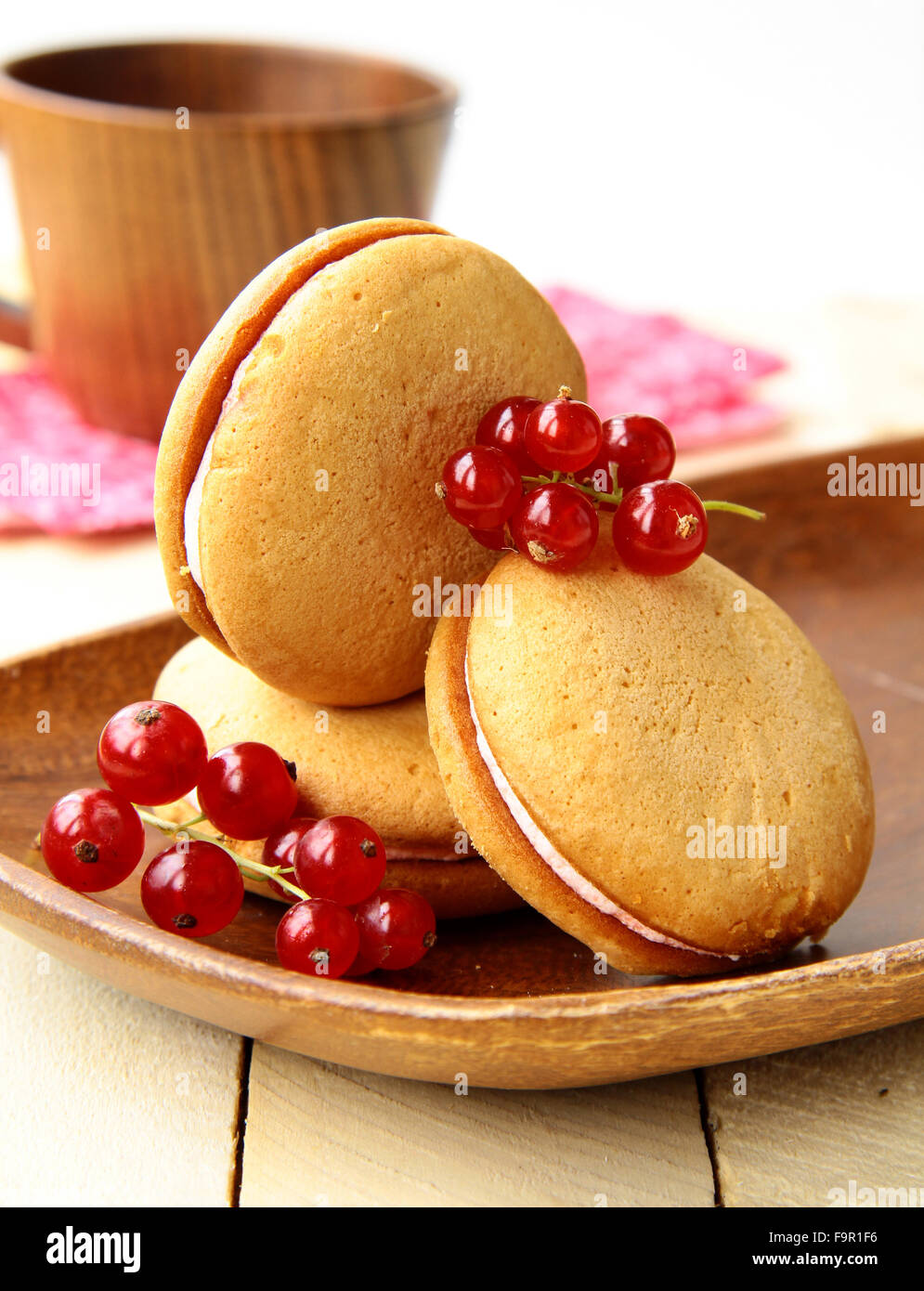 sweet biscuits with fresh currant for dessert Stock Photo - Alamy