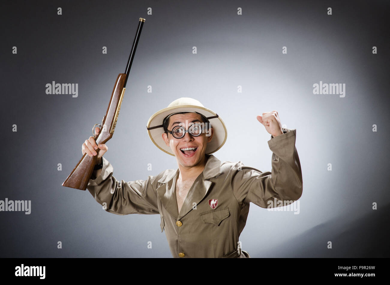 Funny hunter in hunting concept Stock Photo - Alamy