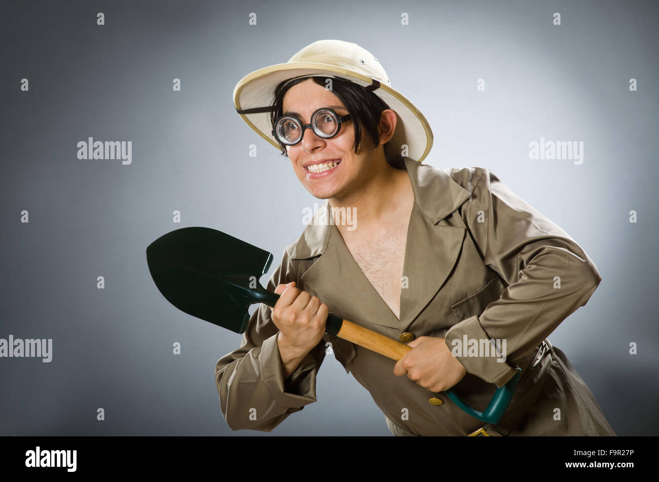 Funny man with the spade Stock Photo - Alamy