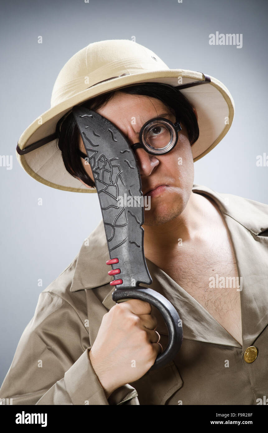 Funny safari traveller in travelling concept Stock Photo - Alamy