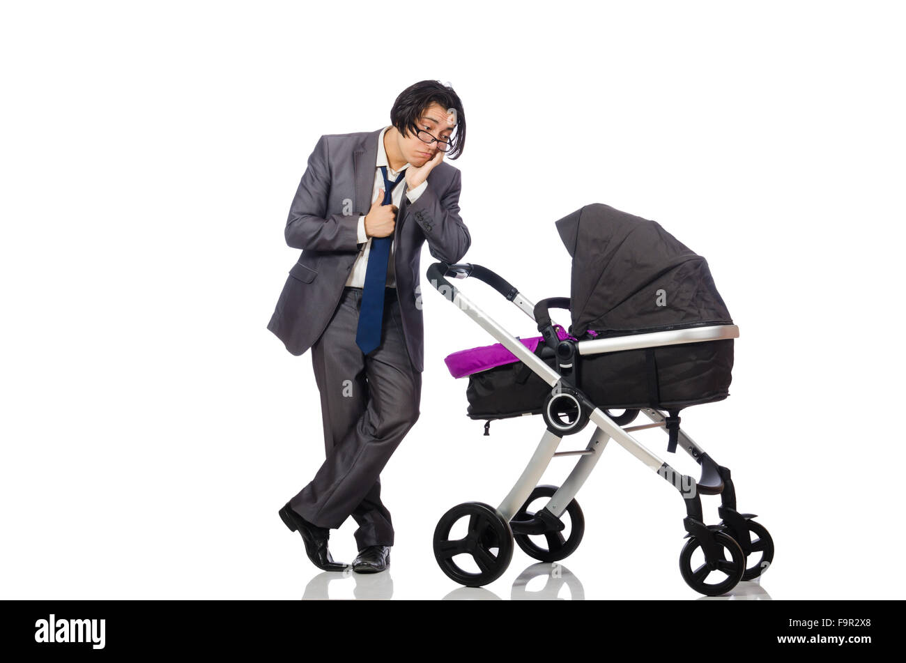 Funny dad with baby and pram on white Stock Photo - Alamy