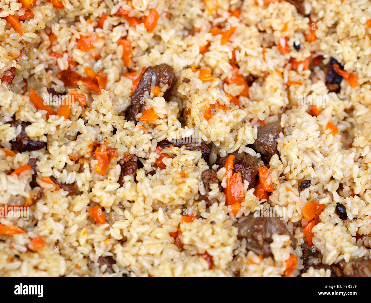 delicious dish of pilau rice with meat photographed close up Stock ...