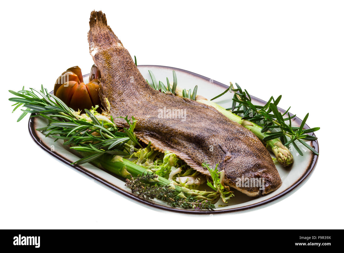 Fish Dover sole roasted Stock Photo - Alamy