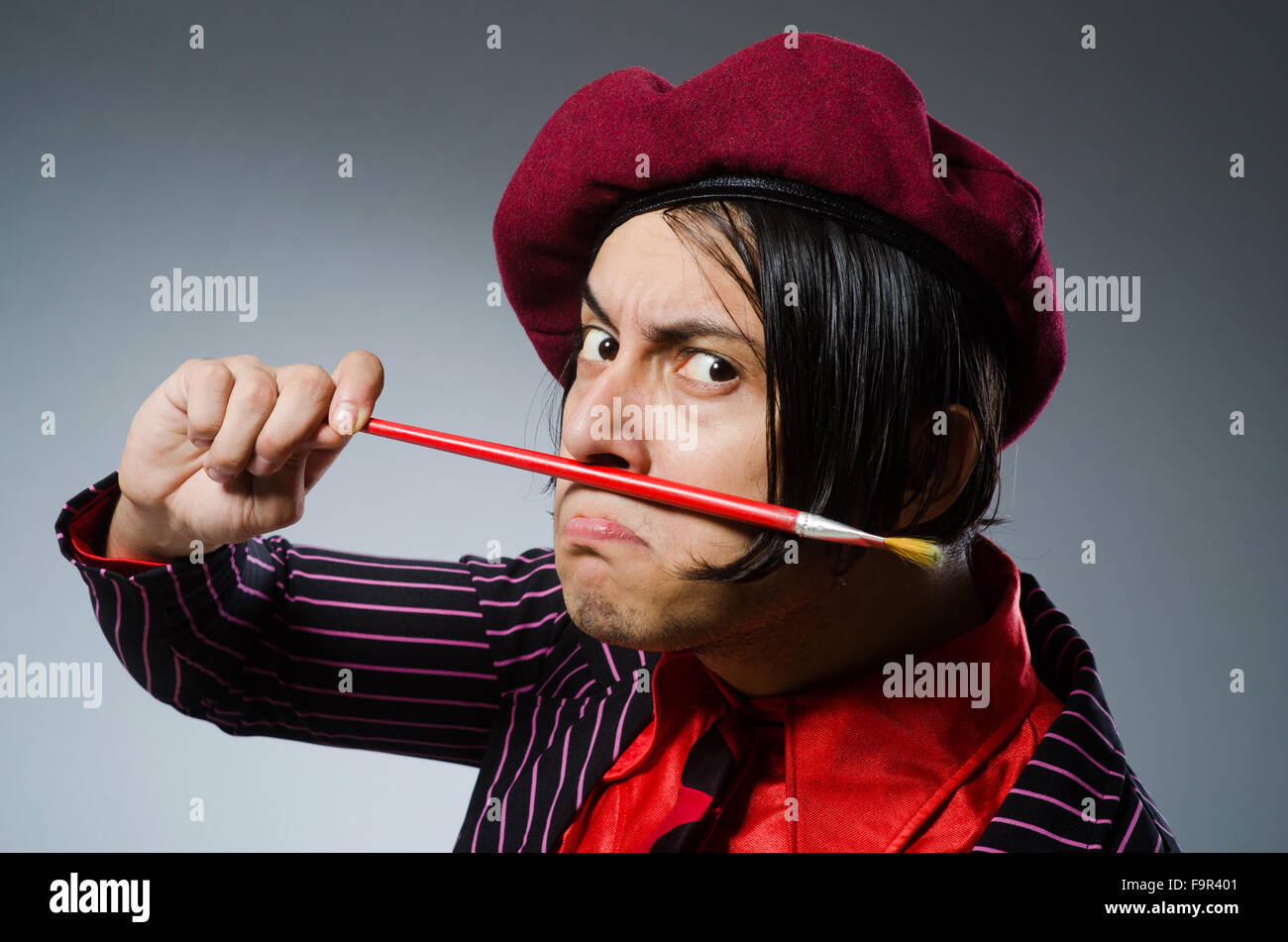 Funny artist with his artwork Stock Photo - Alamy
