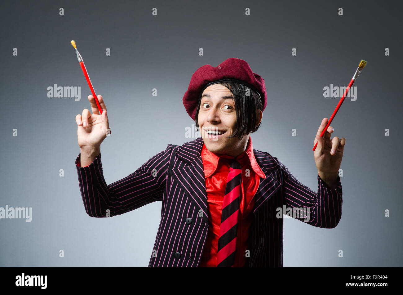 Funny artist with his artwork Stock Photo - Alamy