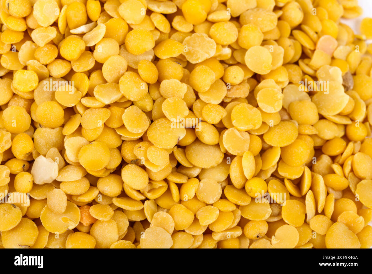 Yellow lentils isolated on white background.Macro shot Stock Photo - Alamy