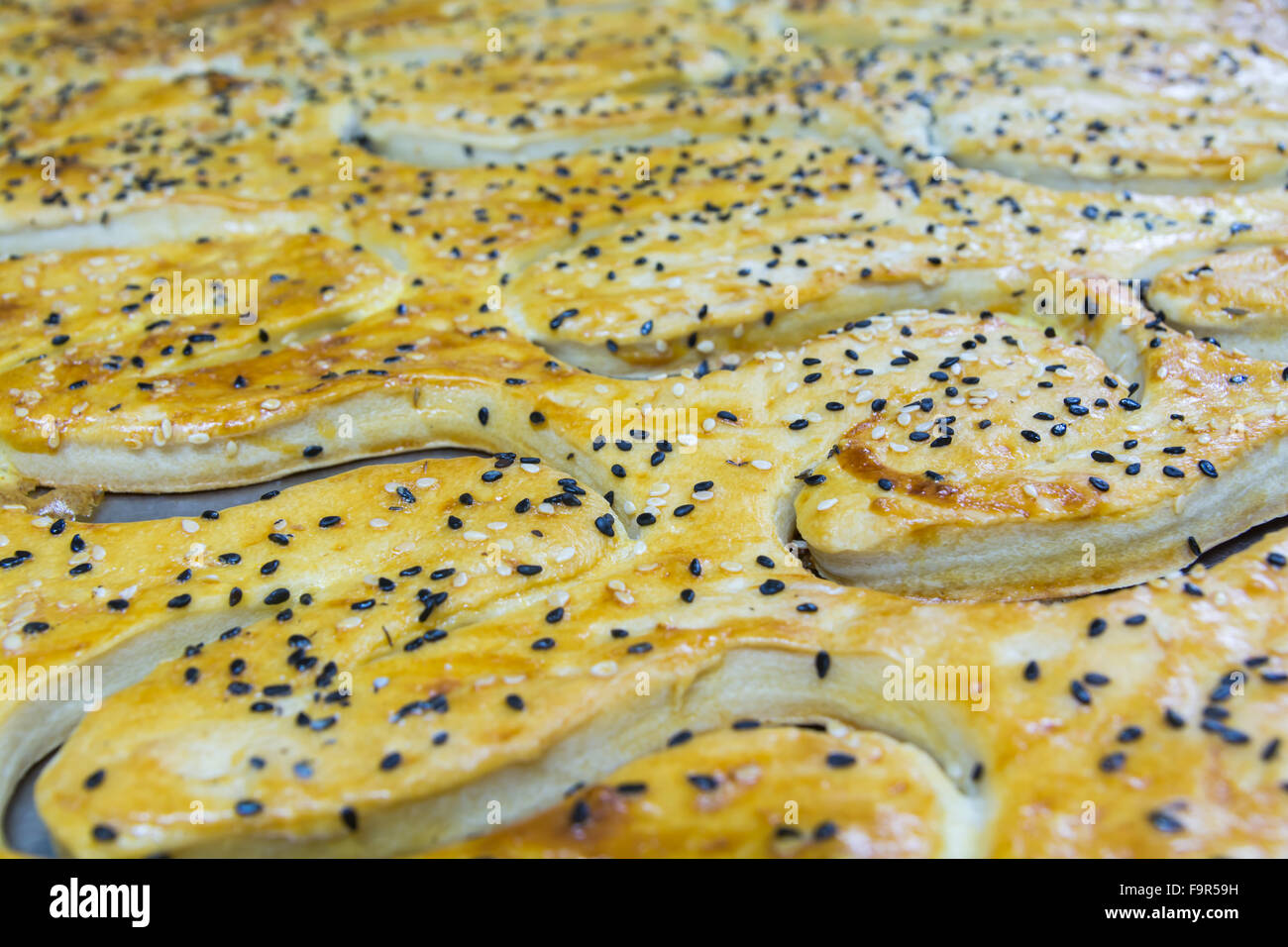 large size bread with sesame, bread and seed background Stock Photo - Alamy