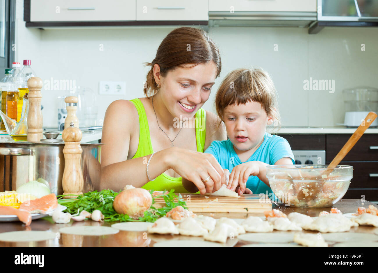 Happy child cooking meat dumplings hi-res stock photography and images ...