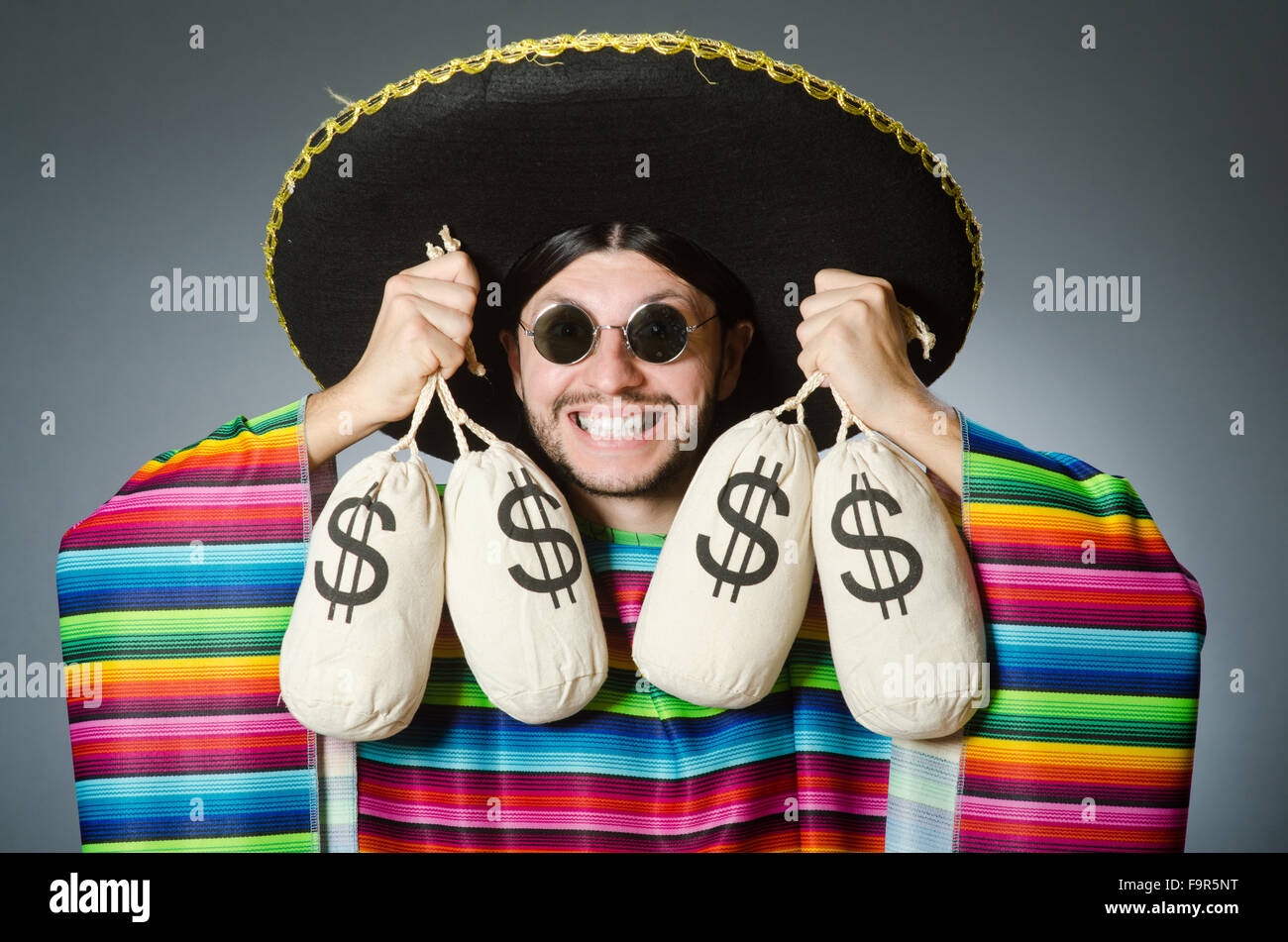 Mexican man with money sacks Stock Photo - Alamy