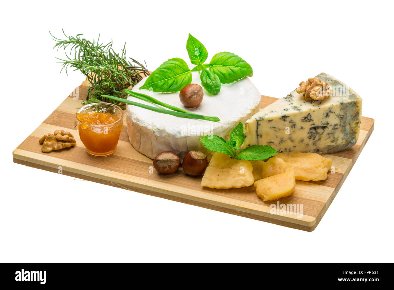 Assorted cheese - brie, dor blue and hard old yellow cheese Stock Photo ...