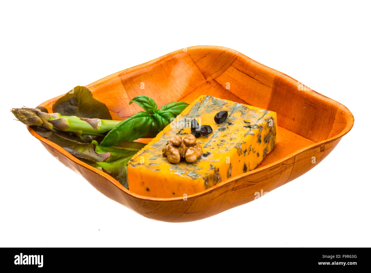 Gold cheese with mould Stock Photo - Alamy