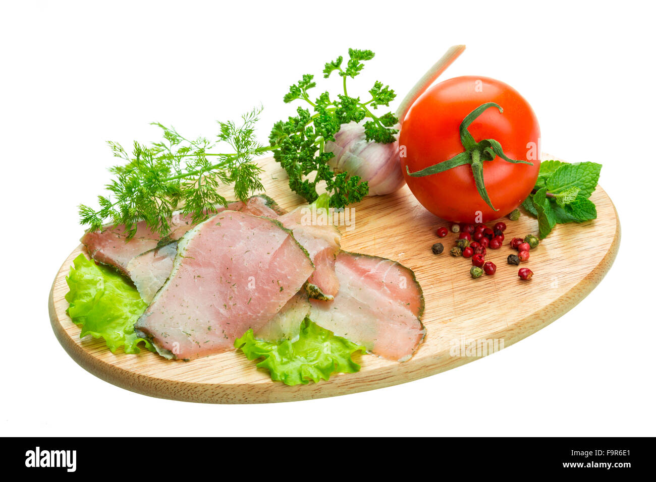 Ripe fresh ham with vegetables Stock Photo - Alamy
