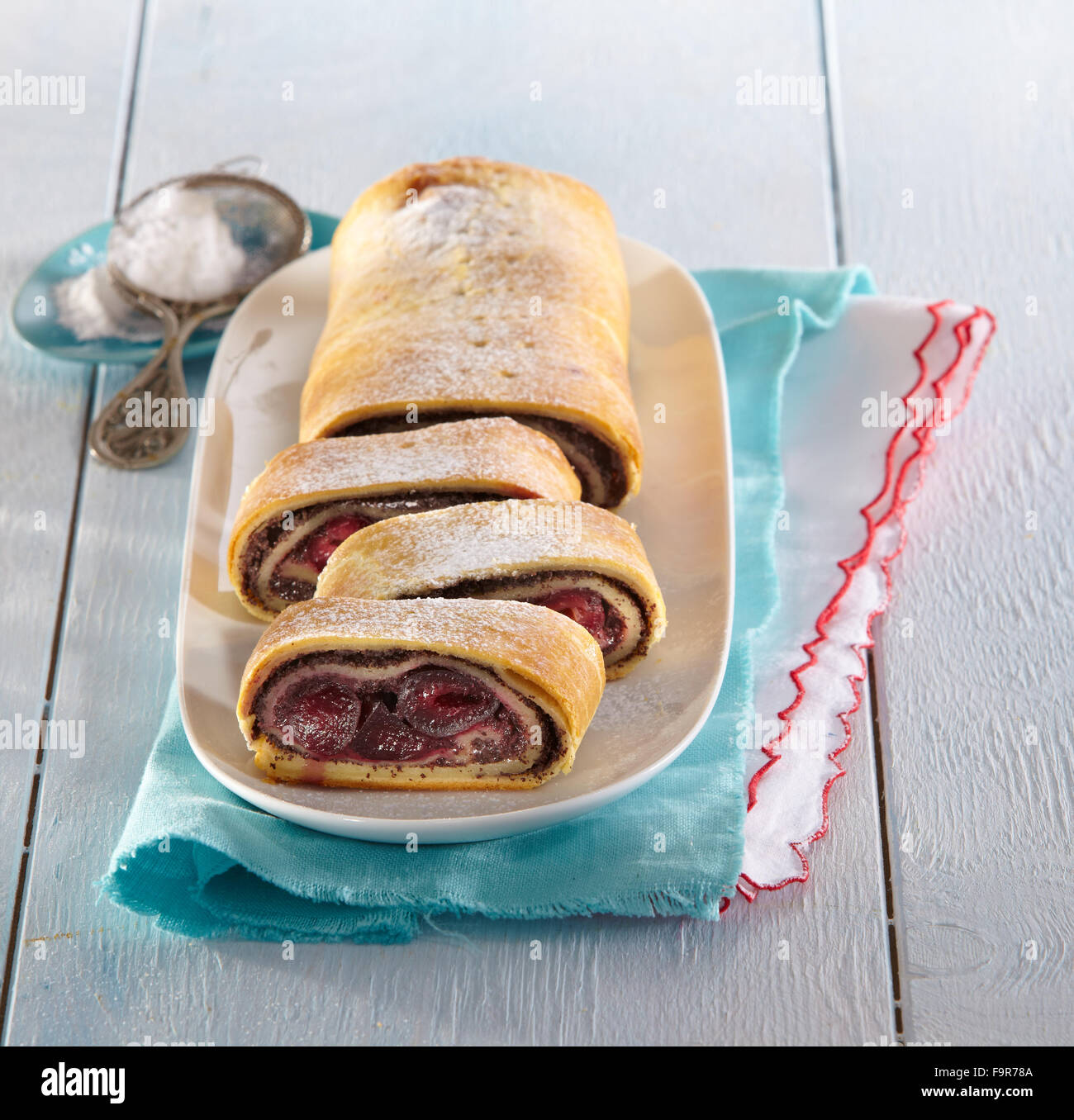 Poppy seed and sour cherry strudel Stock Photo - Alamy