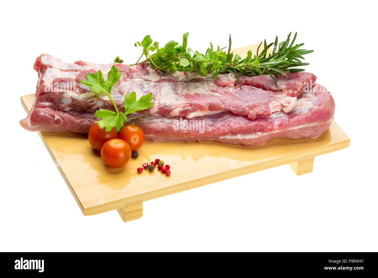 Raw pork meat with herbs and spices Stock Photo - Alamy