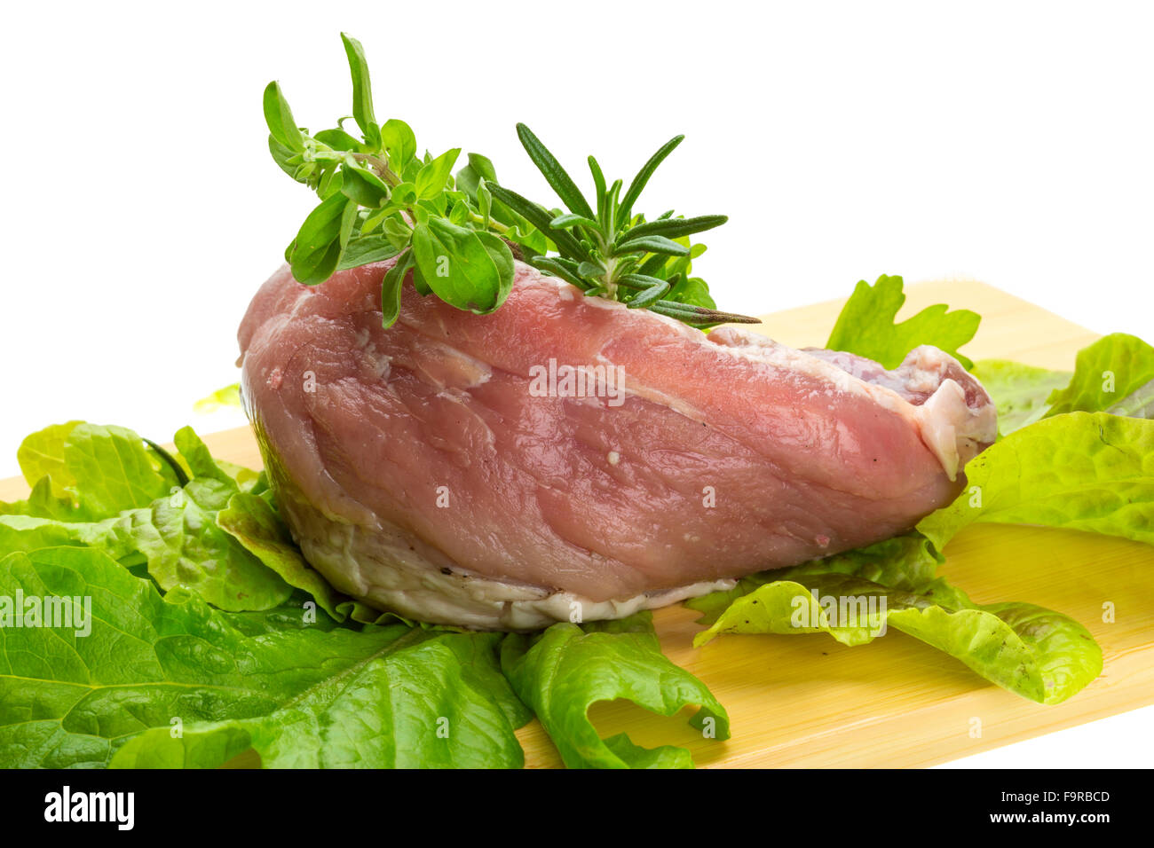 Raw pork meat with herbs and spices Stock Photo - Alamy