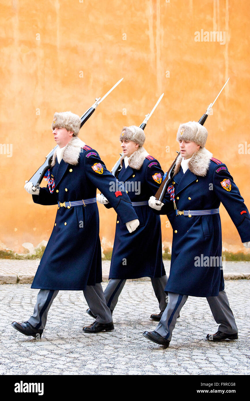 Three guards marching past wall whilst changing at Prague Castle, Czech ...