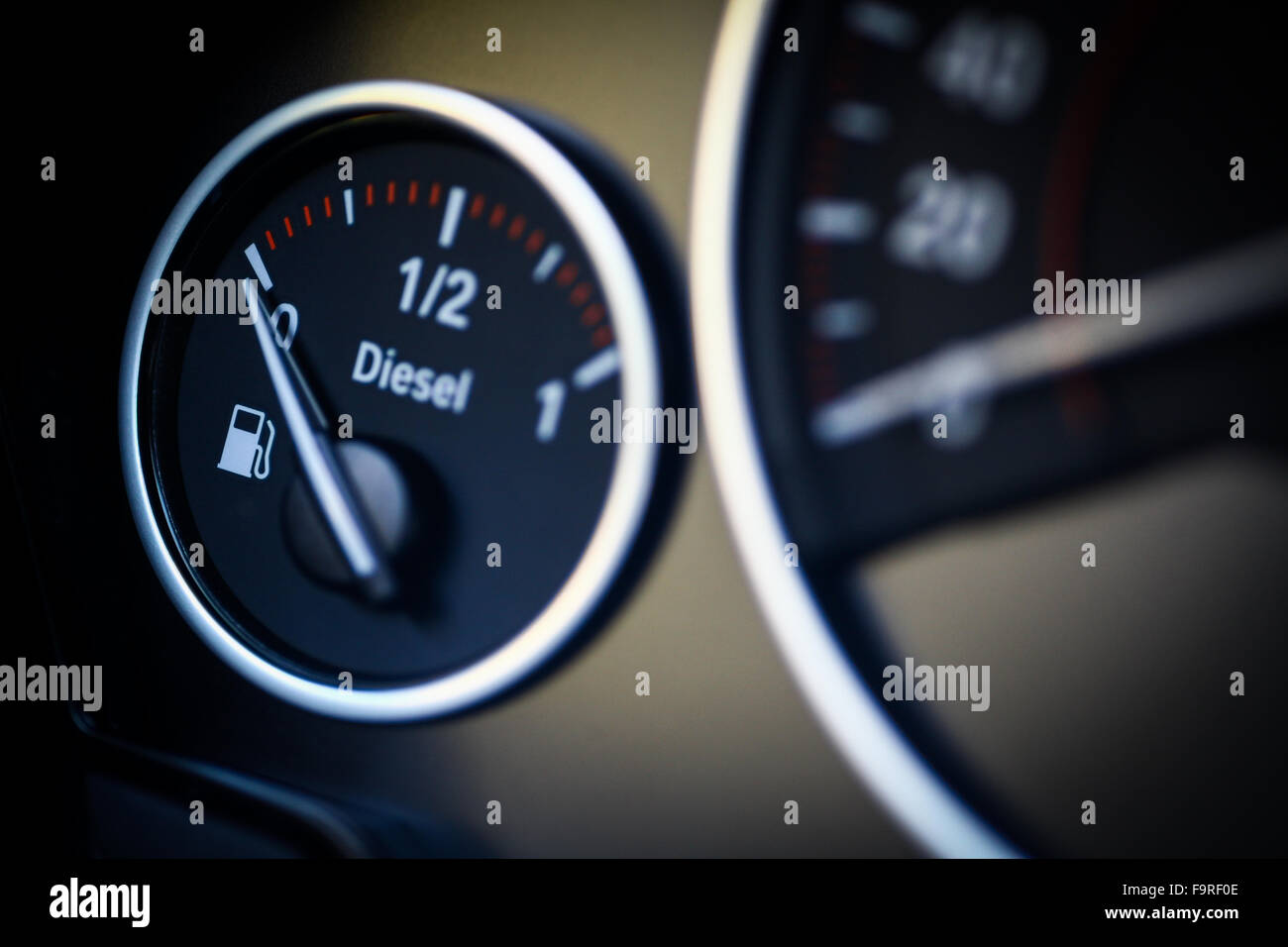 Close-up shot of a fuel gauge in a car Stock Photo - Alamy