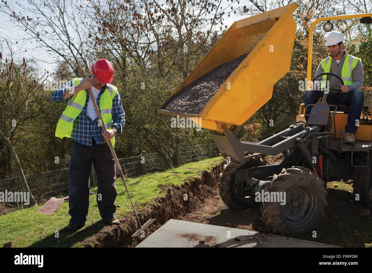 Construction workers using heavy machinery hi-res stock photography and ...