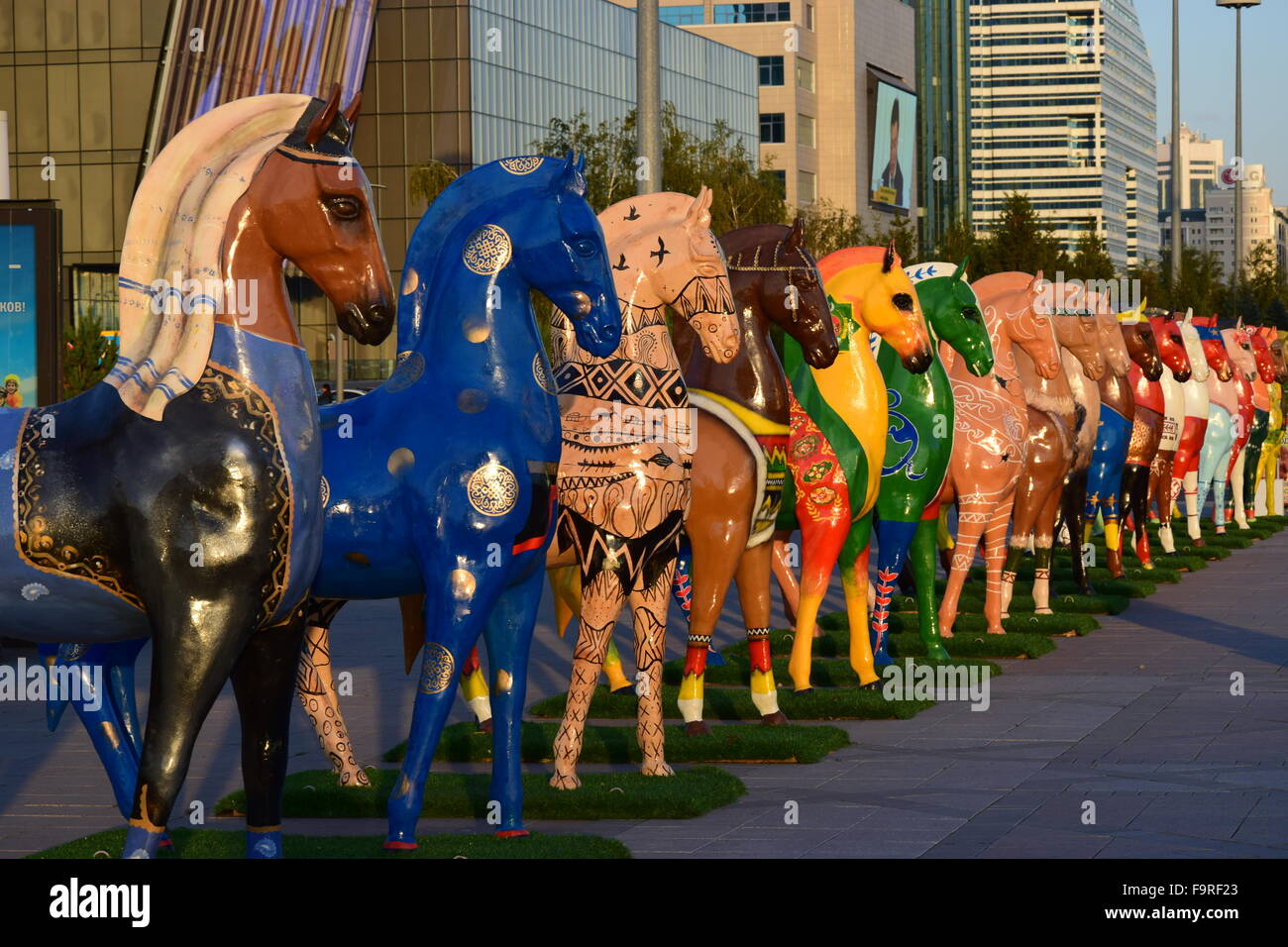 Colorful plastic statues of horses in Astana, Kazakhstan, displayed in ...
