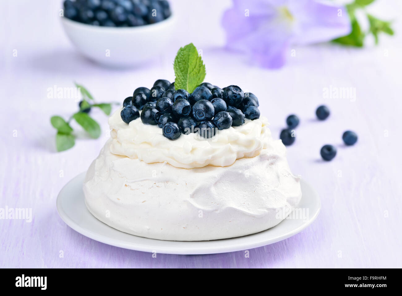 Meringue cake Pavlova with blueberry and whipped cream Stock Photo - Alamy