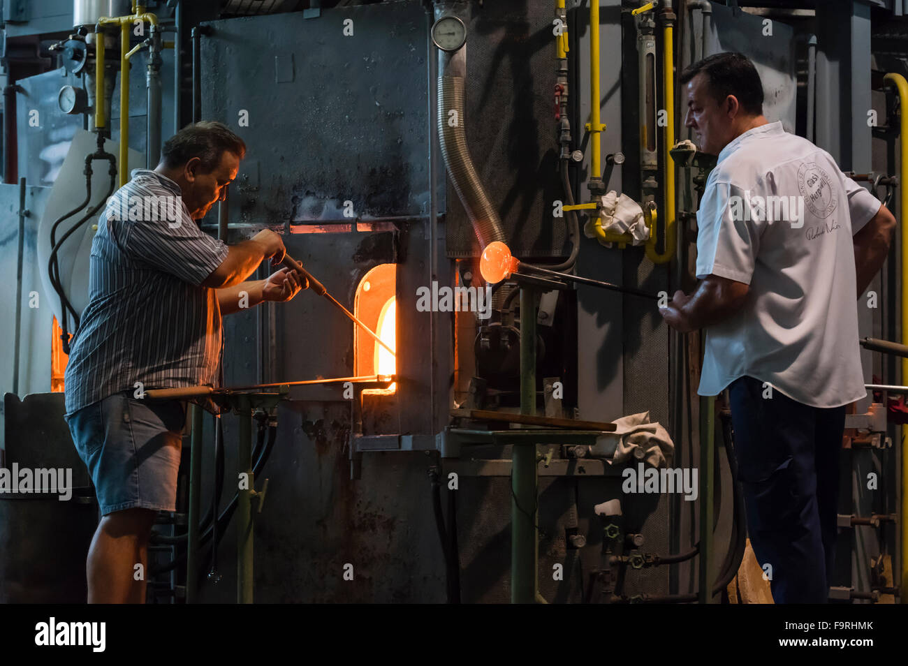 Glassblower work in front furnace hi-res stock photography and images ...