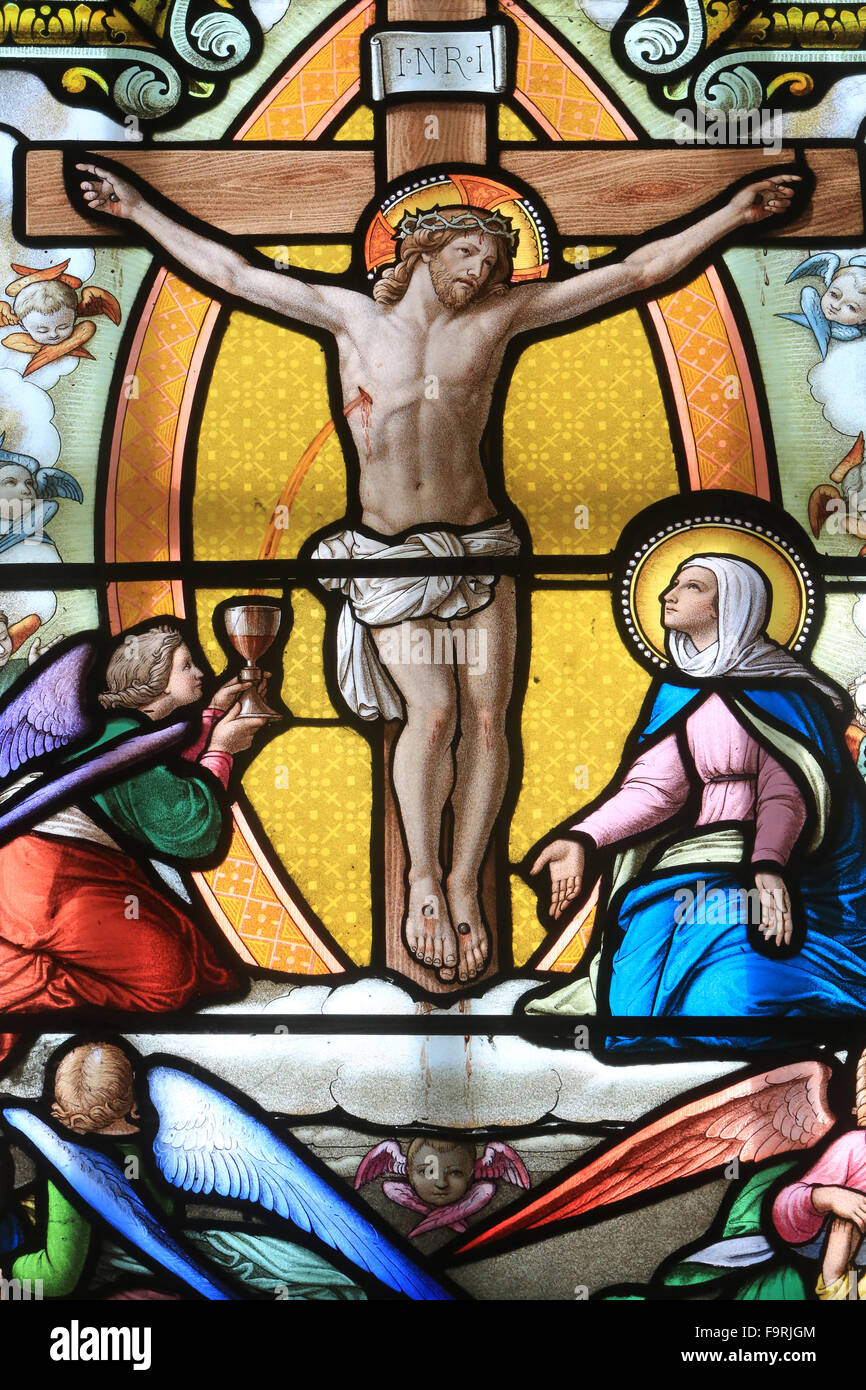 Jesus Christ on the cross. Stained glass window. Shrine of Our Lady of ...
