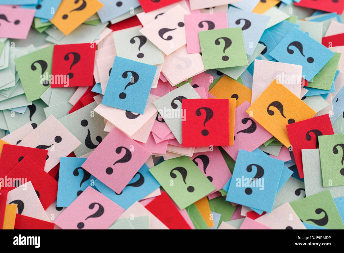 Pile of colorful paper notes with question marks. Close-up Stock Photo ...