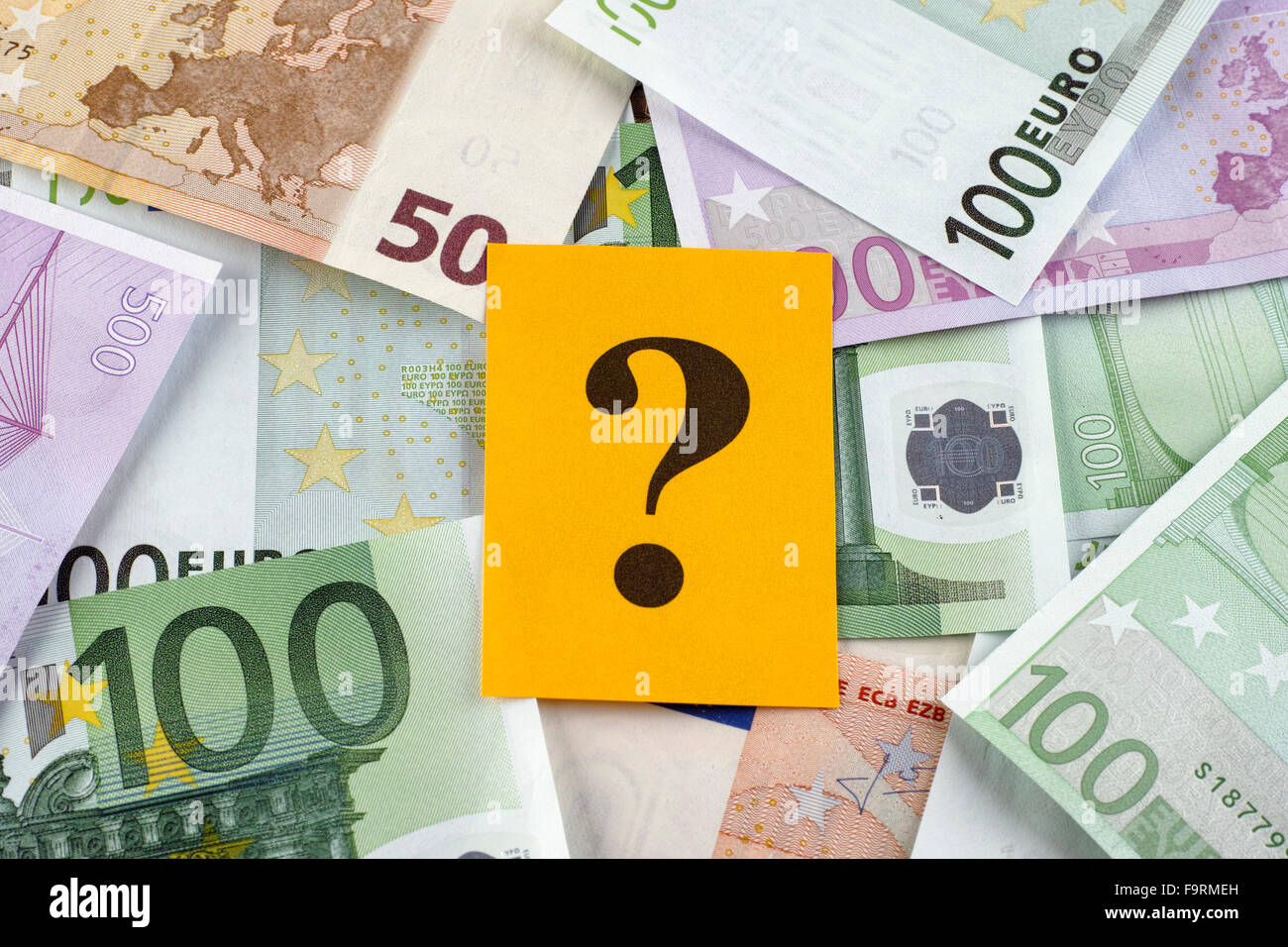 Question mark on euro banknotes Stock Photo - Alamy