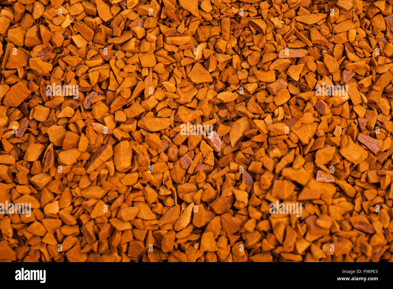 Heap of ground coffee background Stock Photo - Alamy