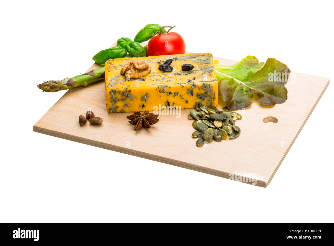 Gold cheese with mould Stock Photo - Alamy