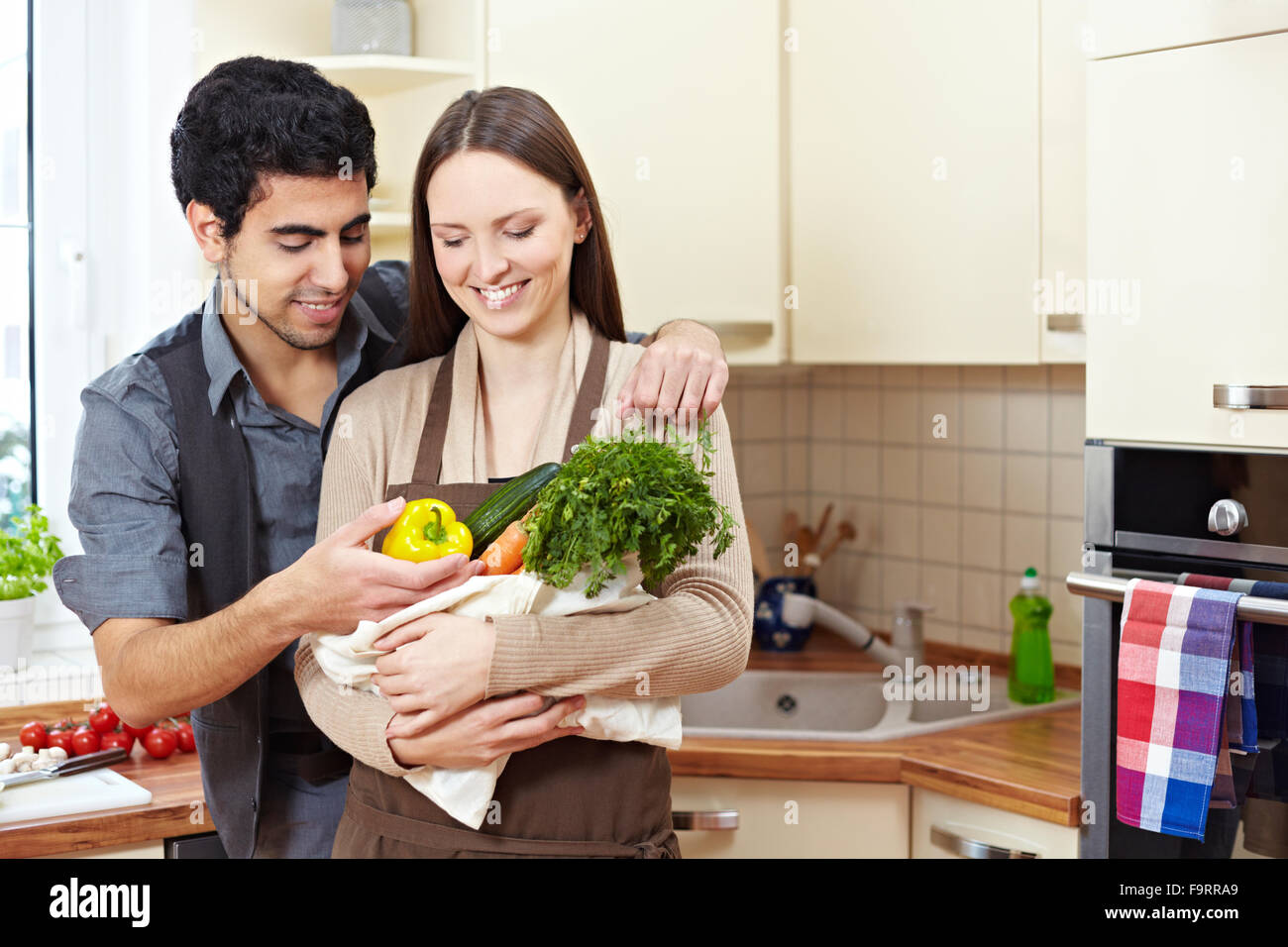 Young joy couple bag vegetables hi-res stock photography and images - Alamy
